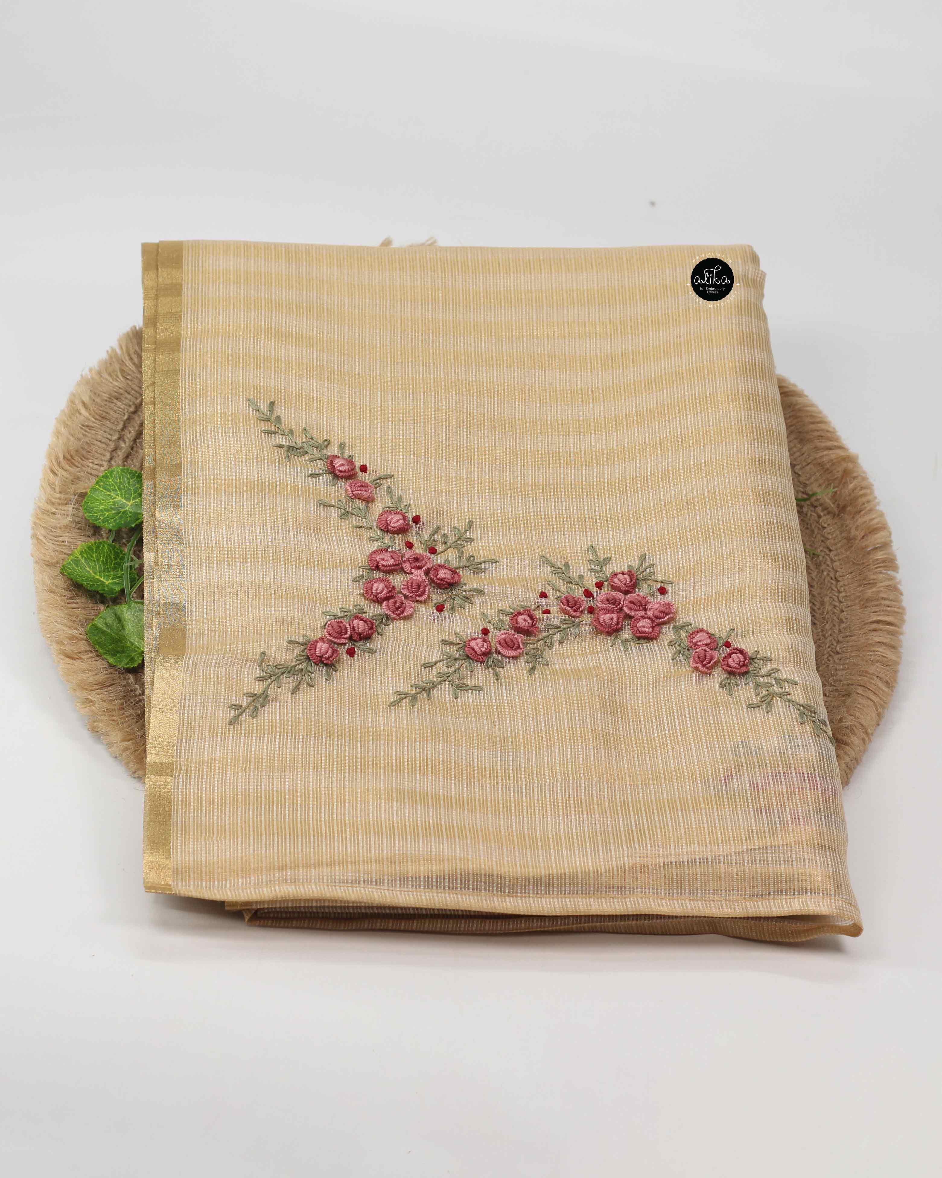 Mauve shade floral themed golden tissue saree. – ALIKA FASHION STORE